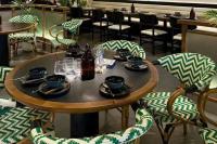 China Black Marble Table and Rattan Chair Customizable Restaurant Furniture Dining Table Set for sale