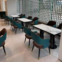 China Customizable Round Marble Hotel Restaurant Furniture with Leather Upholstery Dining Table and Chairs Set for sale