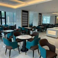 China Customizable Round Marble Hotel Restaurant Furniture with Leather Upholstery Dining Table and Chairs Set for sale
