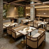 China Customizable Rattan Booth Seating with Durable PU Leather and High Load Capacity for Restaurants for sale
