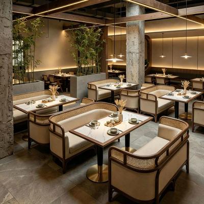 China Customizable Rattan Booth Seating with Durable PU Leather and High Load Capacity for Restaurants for sale