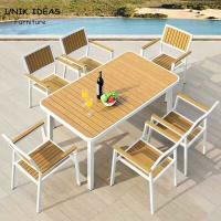 China WPC Board Aluminum Outdoor Table and Chairs Set 160x80x75cm All Weather Garden Furniture for sale