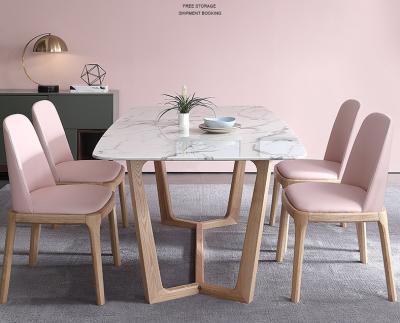 China 180cm Marble White Luxury Dining Table and Chairs 4 Seater 6 Piece Set Minimalist for sale