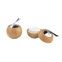 China Empty Cosmetic Bottles Cream Jars with Silvery Spatula 50g Capacity Apple Shaped for sale