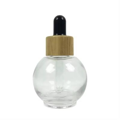 China Ball Shape 20ml 30ml Pink Perfume Empty Cosmetic Essential Oill Dropper Bottle for sale