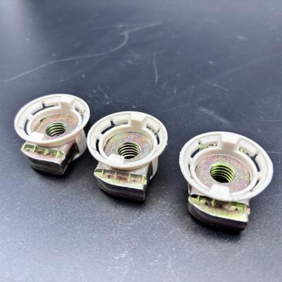 China Custom Yellow Zinc m8 m10 Spring Nut with Plastic Wing for sale