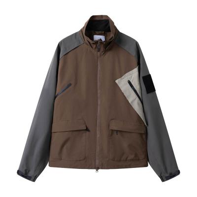 China Men's Water-Repellent Utility Jacket with Color-Block Design and Adjustable Cuffs for Outdoor Wear for sale