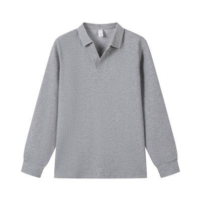 China Unisex Cotton-rich Waffle Knit Classic Polo Shirts with Textured Surface and V-neck Placket for sale
