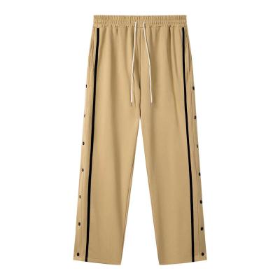 China Men's 260g Polyester French Terry Track Pants with Full Side Button Placket and Contrast Black Stripe for sale