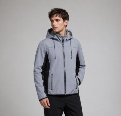 China Men's Colorblock Softshell Jacket with Fleece Lined Hood and Multiple Zip Pockets for sale