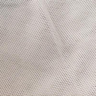 China Warp Knitted Aramid Mesh Fabric 100-140 gsm Fire Retardant Nomex for Rubber Hose Reinforcement for sale