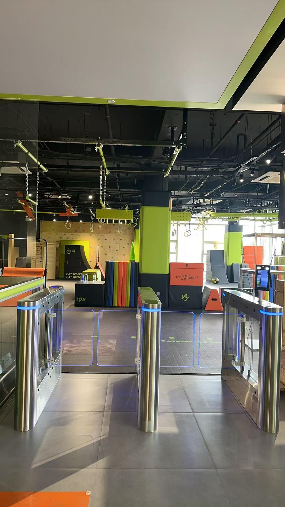 Fitness center turnstile system in operation