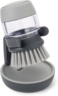 China Dishwasher Kitchen Scrub Brush With Integrated Detergent Soap Dispenser for sale