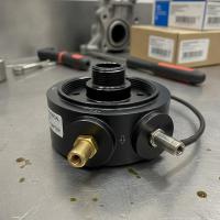 China Universal oil filter sandwich plate adapter, installs between the engine block and oil filter. Features 2dedicated 1/8