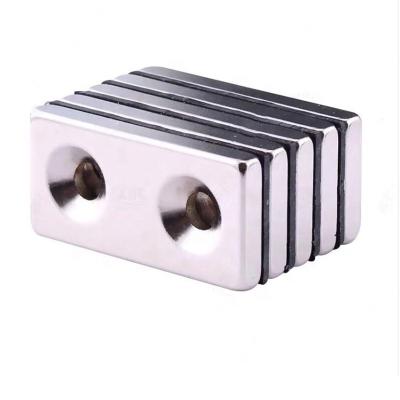 China Permanent Magnetic Materials NdFeB Grade Neodymium Block Magnet with Countersunk Hole for sale