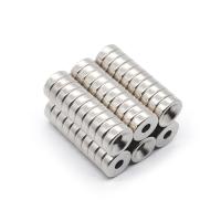 China Composite NdFeB Magnet Round with Hole N35 N52 Rare Earth Tiny Neodymium Magnetic Materials Disc Magnets for sale