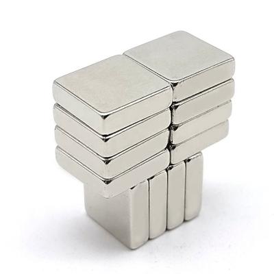 China Custom N35 N42 N52 Block Neodymium Magnet Rectangular Magnet with Magnetization Direction for sale