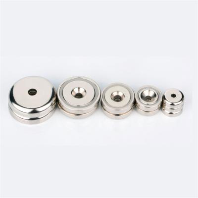 China Moulding Processing Service Ndfeb Pot Magnet with Countersunk Holes and /-0.05mm Tolerance for sale