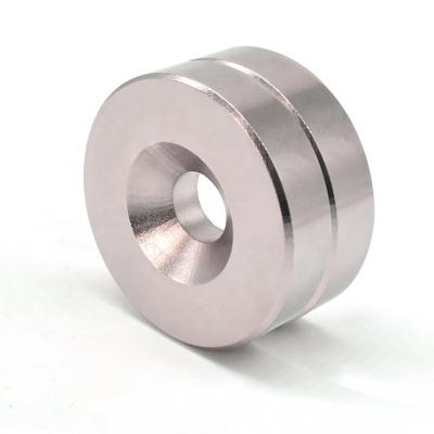 China NdFeB N35 N52 Disc Round Ring with Custom Size Dia Sintered Countersunk Hole and Screw for sale
