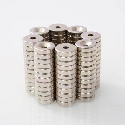 China N35 N42 N50 N52 Neodymium Magnet with Countersunk Hole Rotors and Composite NdFeB Magnet for sale