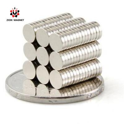 China Tiny Round Neodymium Magnet with /-0.01-0.05mm Tolerance of Rare Earth Materials for sale