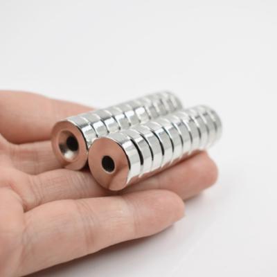 China NdFeB Grade Neodymium Round Magnetics with Center Hole Tolerance /-0.01-0.05mm for sale