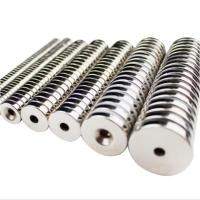 China NdFeB Grade Neodymium Round Magnetics with Center Hole Tolerance /-0.01-0.05mm for sale