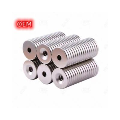 China NdFeB Magnet Composite Permanent Super Strong N35 N42 N50 N52 Round Magnet with Hole for sale