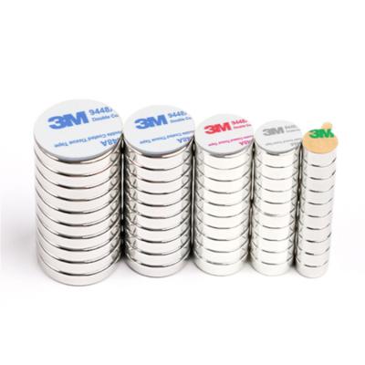 China n33 n52 neodymium 3m adhesive disc magnets with customizable magnetization direction for sale