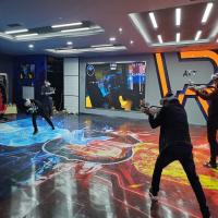 China VR Arena Multiplayer VR Shooting Game with 5-10 Player Capacity 1-Year Warranty and Immersive 9D Experience for sale