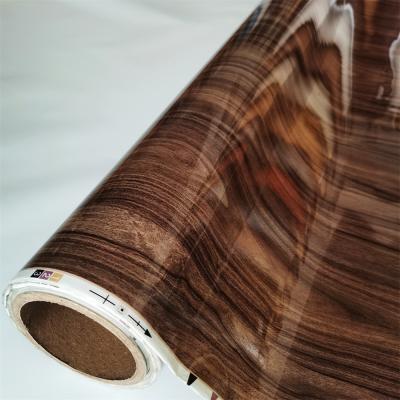 China PVC Glossy Film Wood Effect Self Adhesive Interior Film For Door Skin for sale