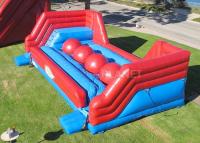 China Red Balls Inflatable Sports Games Wipe Out Interactive Obstacle Course for sale