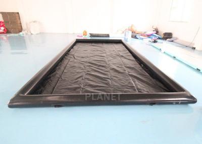 China Black Portable Inflatable Car Wash Mat 10'x20' with 0.6mm PVC Material and 4-inch Water Containment Bumpers for sale