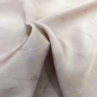 China Abstract pattern 140cm 100% Viscose Jacquard Satin Fabric Jacquard Dress Material for sale