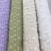 China 145cm Polyester Embossed Jacquard Fabric Embroidered Crinkled Crepe Fabric for sale