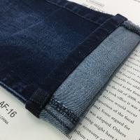 China 11.9oz 55.5 inch Stonewashed Denim Fabric 64% Cotton 23% Poly 10% Rayon 3% Spandex for sale