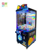 China Drop In Win Claw Crane Machine With Rotating Prize Hole Commercial Ball Catching Machine for sale