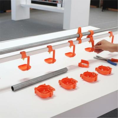 China Poultry Farming Floor Raising Plastic Pan Feeding Line With Stainless Nipple Drinker for sale
