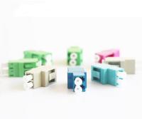 China Plastic Housing Quad LC Fiber Optic Adapter OM4 For Telecommunication Network for sale