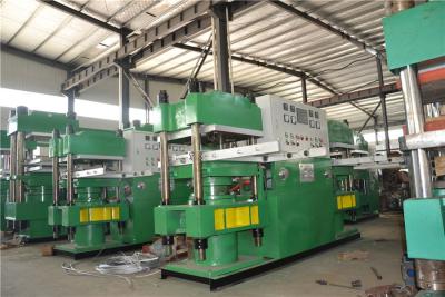 China 100T Full Automatic Rubber Hydraulic Vulcanizing Press Machine with PLC Control System and 15-20MN Pressure Range for sale
