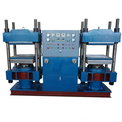 China Electric Heating Rubber Compression Vulcanizer Double Station 0.25MN 300x300mm for sale