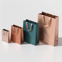 China Brown Cardboard Paper Gift Bags Bulk Customizable For Party Favors for sale