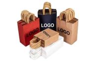 China Custom Printed Matte Kraft Paper Carry Bag Twisted Handles Greaseproof for sale