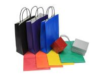 China Bulk Cardboard Gift Paper Goodie Bags 350gsm Recyclable Kraft Paper Packaging With Handles for sale