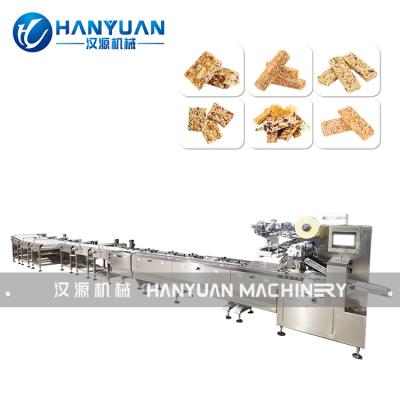 China Puffed Rice Candy Bar Packing Machine for sale