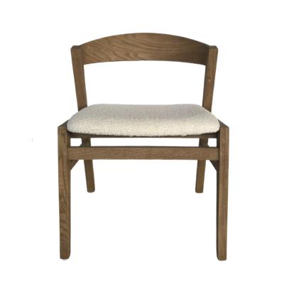 China Contemporary Designer Dining Chair with Curved Back and Soft Cotton Cushion – Armrest-Free for sale
