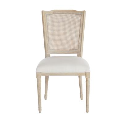 China French-Style Dining Chair with Carved Details, Natural Rattan Back, and Linen Upholstered Seat for sale