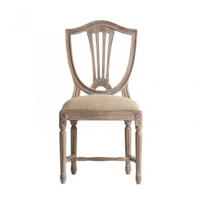 China Designer French Style Dining Chairs With Unique Backrest And Linen Upholstered Seat for sale