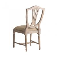 China Designer French Style Dining Chairs With Unique Backrest And Linen Upholstered Seat for sale
