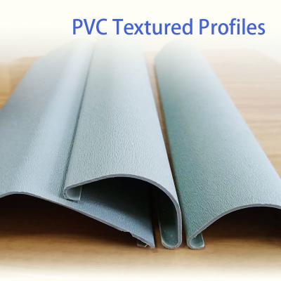 China Ultraviolet Resistance Extruded Plastic Coextrusion Trim Profiles PVC Channel for sale